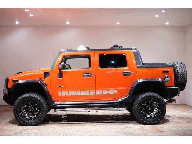 Orange Hummer H2 Truck