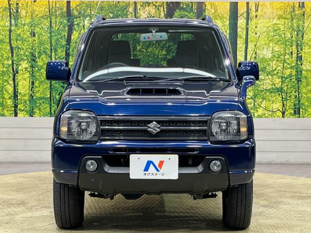 ジムニー（スズキ）XC 4WD 5MT CDオーディオ ルーフレール 電動格納ミラー キーレス 純正16インチアルミホイール ヘッドライトレベライザー 盗難防止システム バニティーミラー ...