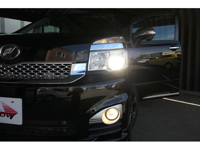 ヴォクシー（トヨタ）ZS 煌III モデリスタエアロ 純正8インチナビDTV 両側パワースライドドア ハーフレザーシート パドルシフト TV ...