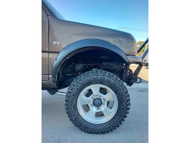 スズキ ジムニー XG ローンブラックOK後期型5MTターボ3インチリフトアップ2インチボディーリフト前後ラテラルラッド強化リーディングトレーディングアームブレーキホース延長マキシスクリーピー ...