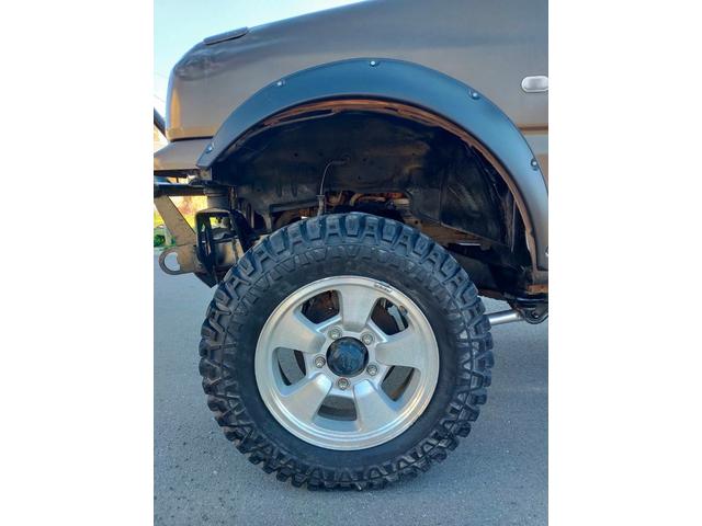 スズキ ジムニー XG ローンブラックOK後期型5MTターボ3インチリフトアップ2インチボディーリフト前後ラテラルラッド強化リーディングトレーディングアームブレーキホース延長マキシスクリーピー ...