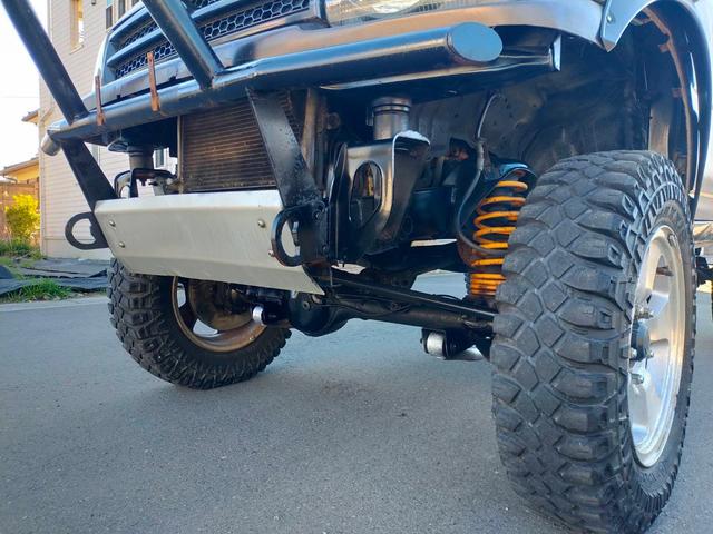 スズキ ジムニー XG ローンブラックOK後期型5MTターボ3インチリフトアップ2インチボディーリフト前後ラテラルラッド強化リーディングトレーディングアームブレーキホース延長マキシスクリーピー ...