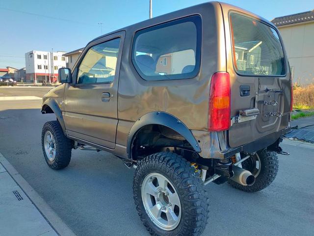 スズキ ジムニー XG ローンブラックOK後期型5MTターボ3インチリフトアップ2インチボディーリフト前後ラテラルラッド強化リーディングトレーディングアームブレーキホース延長マキシスクリーピー ...