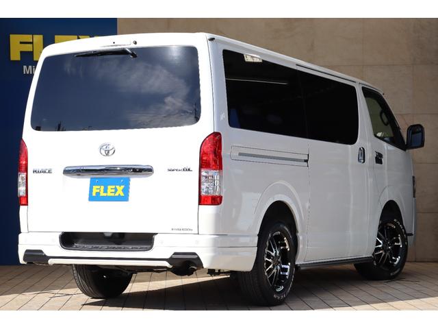 ハイエースバン（トヨタ）スーパーGL ダークプライムII TRDフロントスポイラー TRDリアアンダースポイラー TRDサイドスカート MKW16インチAW NASCARタイヤ JAOS製ドア ...