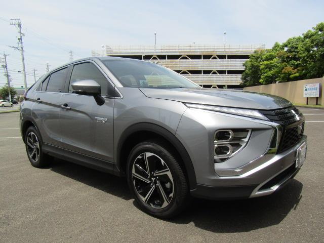 三菱 エクリプスクロスPHEV G スマートキ―PスタートETCケンウッド9インチフローティングナビ地デジBカメラe－アシストレーダークルーズC黒ハーフレザー電気温水式シートパワーシートヘッド ...