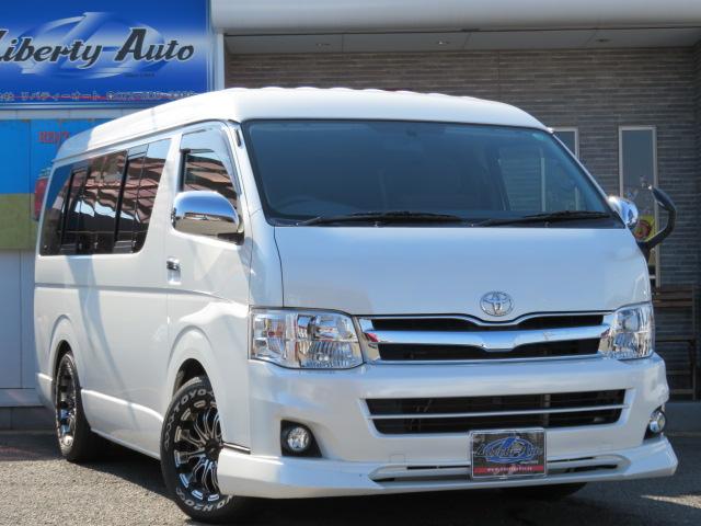 トヨタ ハイエースワゴン GL Fエアロ16AWローダウン左R電動スライドT－FOX対面シート＆ベッドキット床フローリング仕様テーブルLED照明HDDナビ地デジBカメラRモニターHIDライト ...