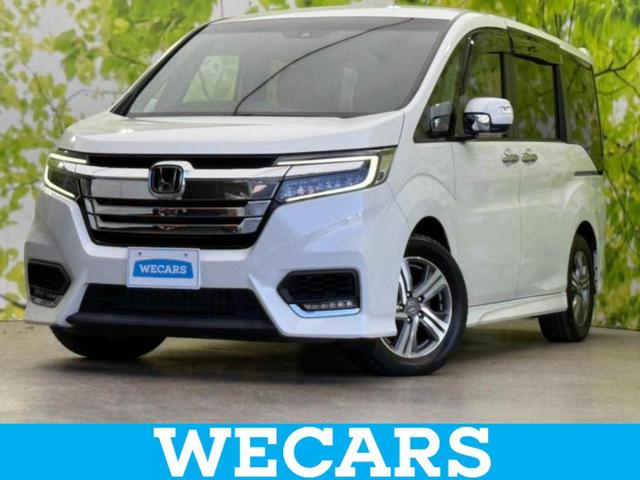 ホンダ ステップワゴンスパーダ eHEVスパーダG・EXホンダセンシング 保証書／純正 9インチ SDナビ／ホンダセンシング／両側電動スライドドア／シートヒーター 前席／車線逸脱防止支援 ...