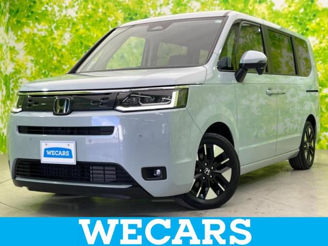 ホンダ ステップワゴン eHEVエアー 保証書／純正 9インチ SDナビ／ホンダセンシング／両側電動スライドドア／全方位モニター／車線逸脱防止支援システム／パーキングアシスト バックガイド ...