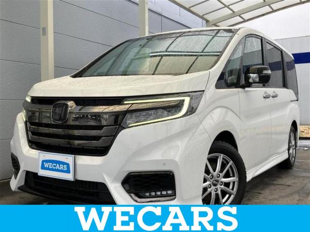 ホンダ ステップワゴンスパーダ eHEVスパーダG・EXホンダセンシング 保証書／純正 10インチ SDナビ／フリップダウンモニター 純正 11．6インチ／衝突安全装置／両側電動スライドドア ...
